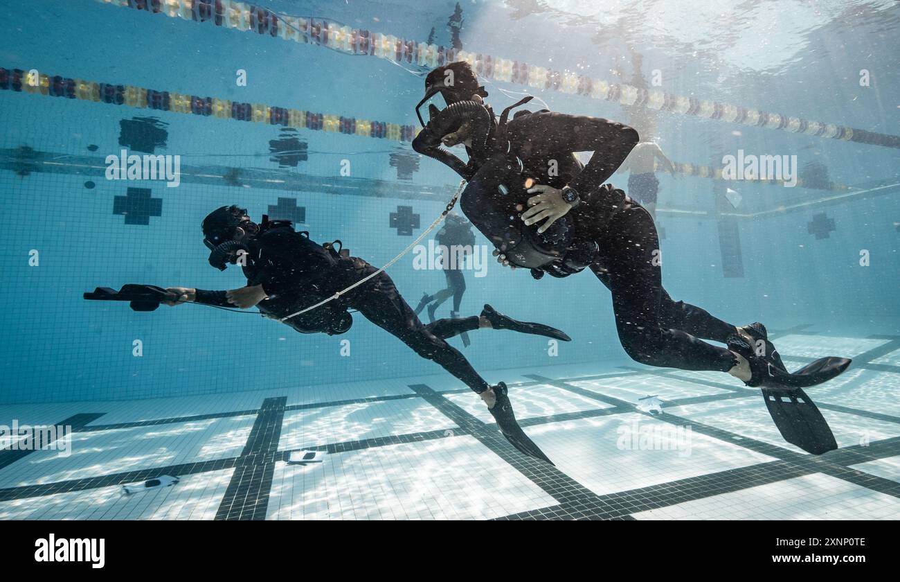 Indian Marine Commando Force (MARCOS) operators conduct dive training ...