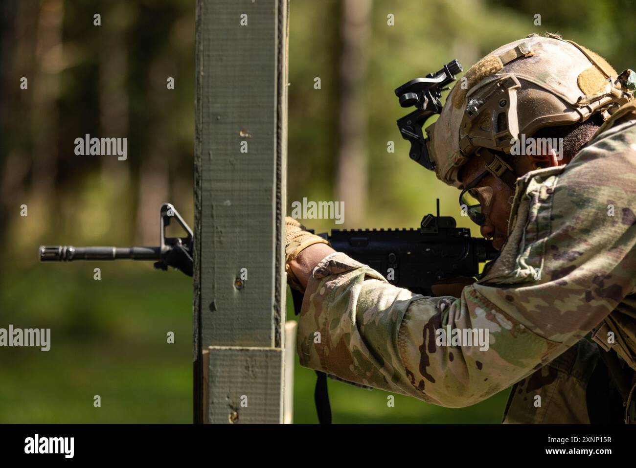 A U.S. Soldier, assigned to U.S. Army Europe and Africa, fires an M4A1 ...