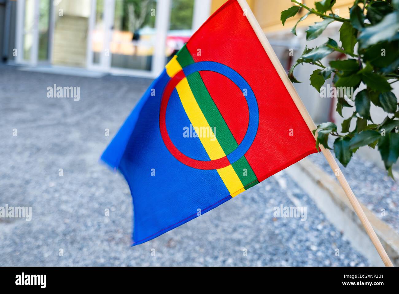 Sami nation flag in Nordland, Norway. Sami flag is the flag of Sami people, one of the ...