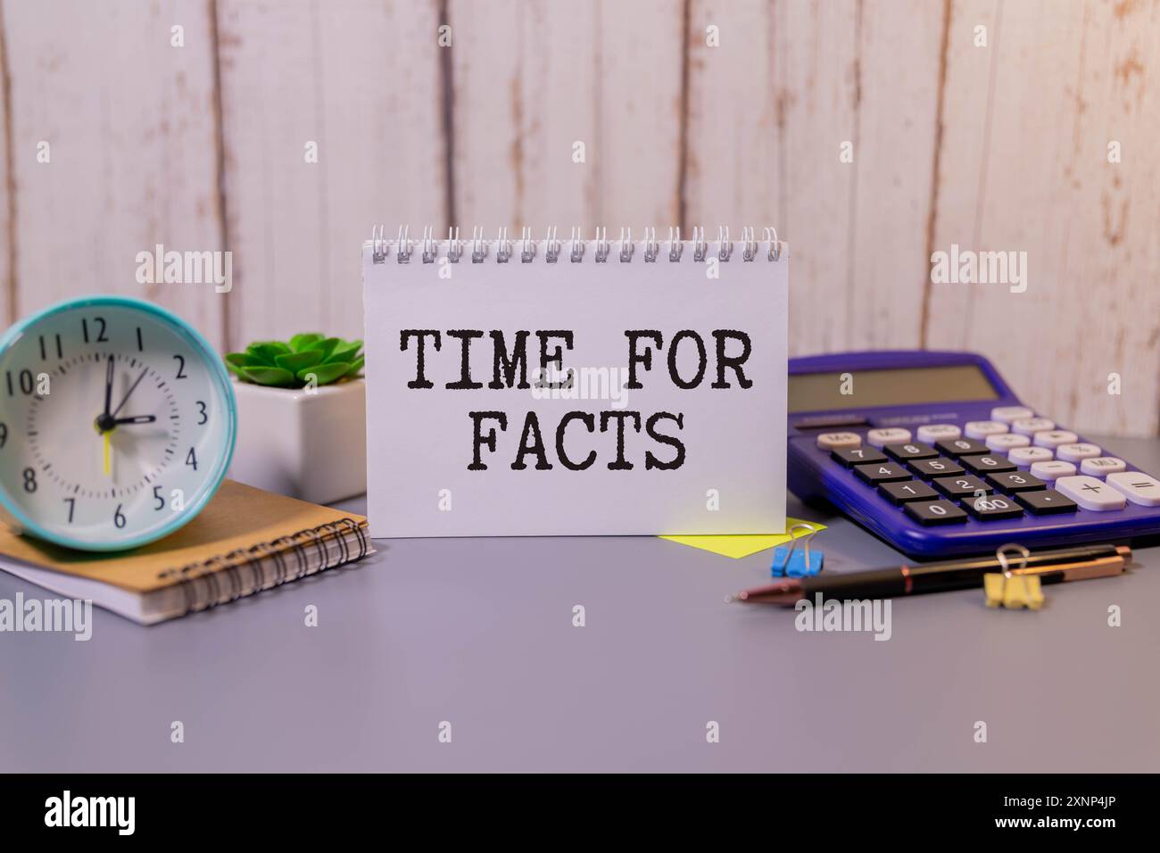 TIME FOR FACTS. notepad on a wooden background with text Stock Photo ...