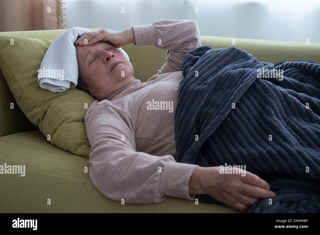 Frustrated sick woman lying hi-res stock photography and images - Alamy