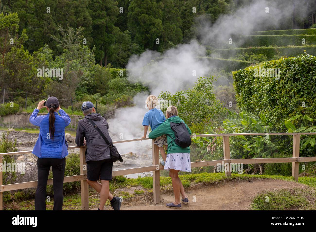 Tourists looking at Caldera in Furnas Lake "Lagoa das Furnas". Caldera ...