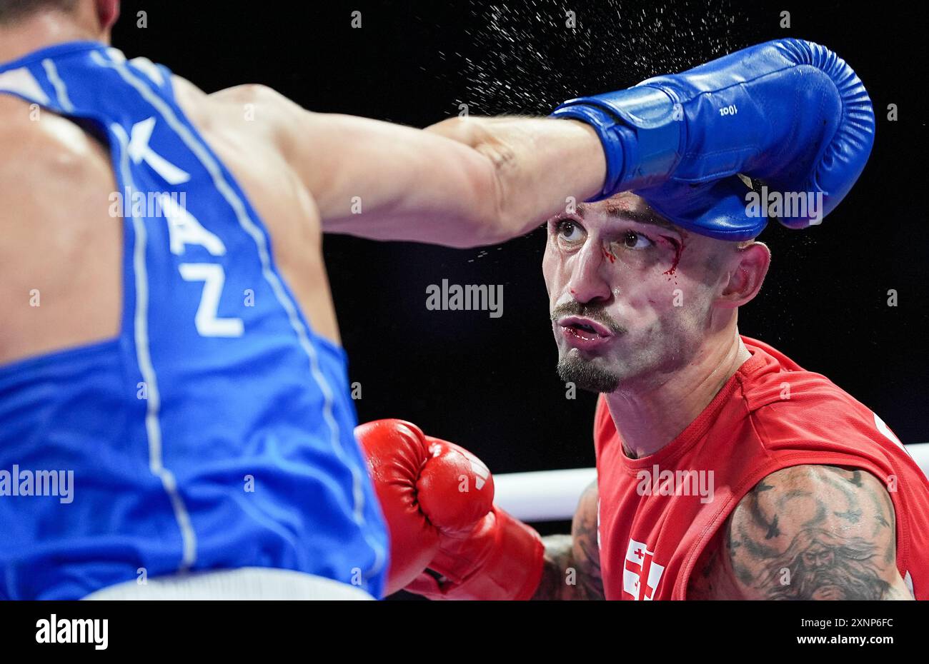 Paris, France. 1st Aug, 2024. Lasha Guruli (R) of Georgia competes with ...