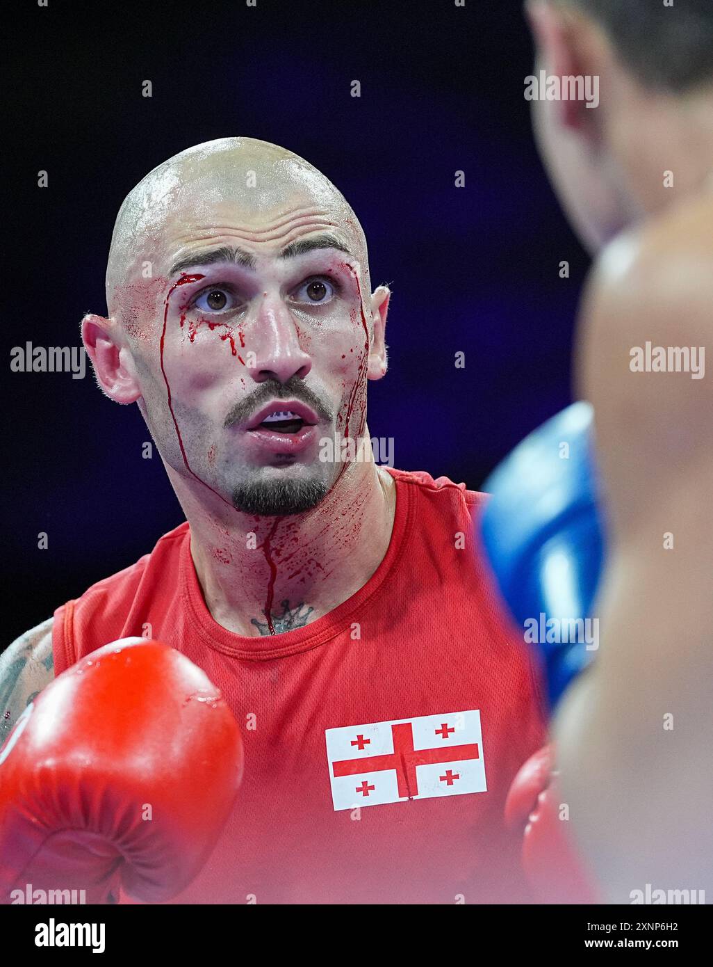 Paris, France. 1st Aug, 2024. Lasha Guruli (L) of Georgia competes with ...