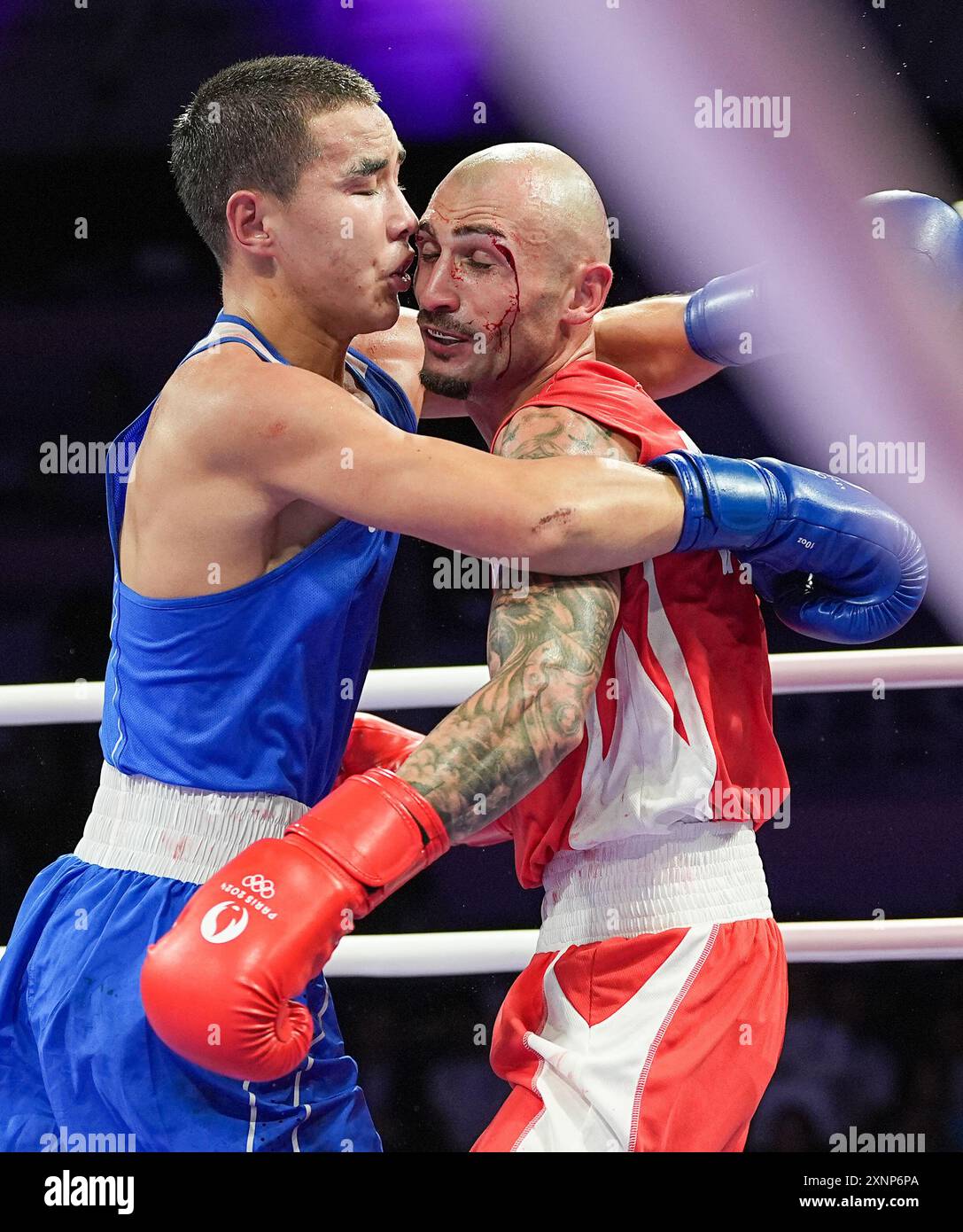 Paris, France. 1st Aug, 2024. Lasha Guruli (R) of Georgia competes with ...