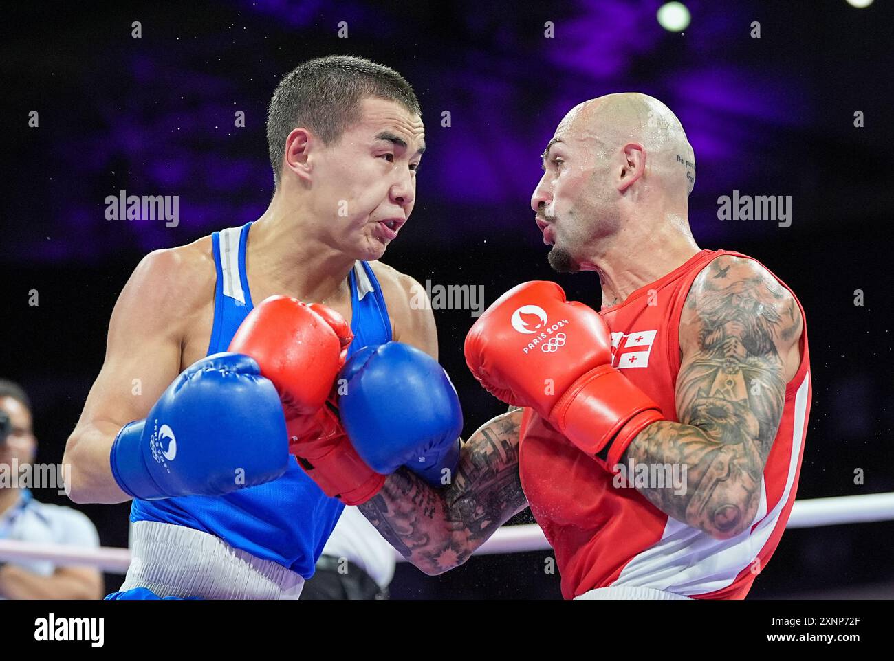 Paris, France. 1st Aug, 2024. Lasha Guruli (R) of Georgia competes with ...