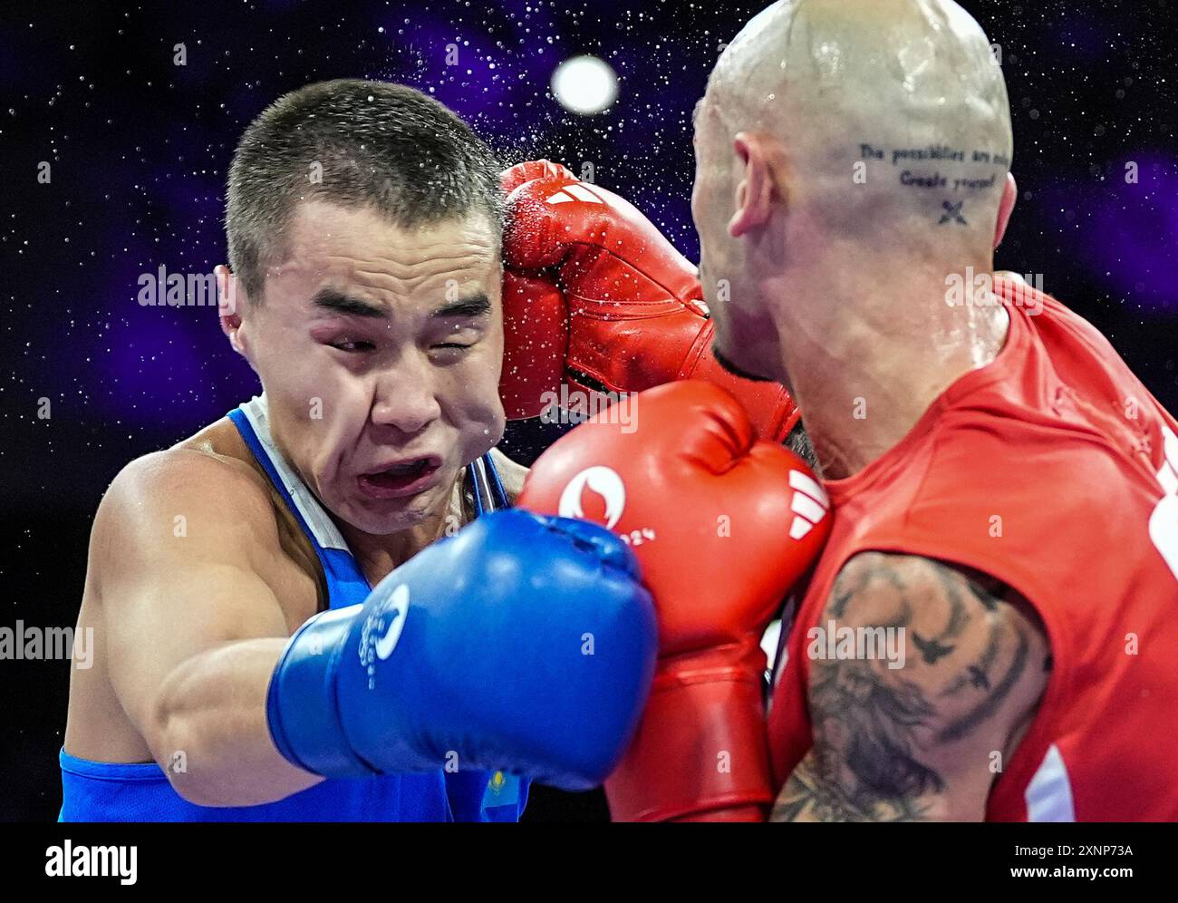 Paris, France. 1st Aug, 2024. Lasha Guruli (R) of Georgia competes with ...