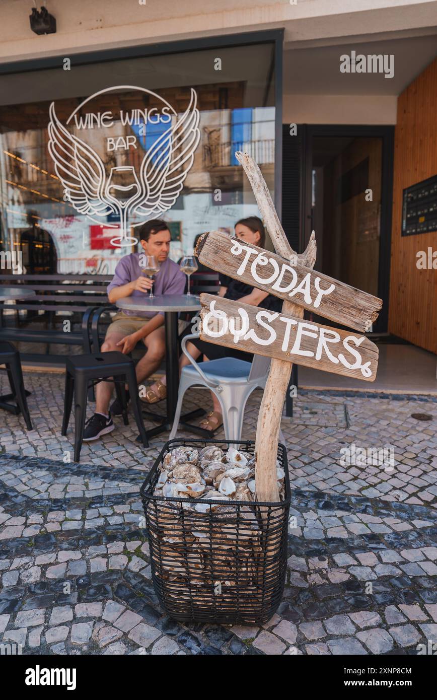 Charming Street Scene with Wine Wings Bar in Aveiro, Portugal Stock ...