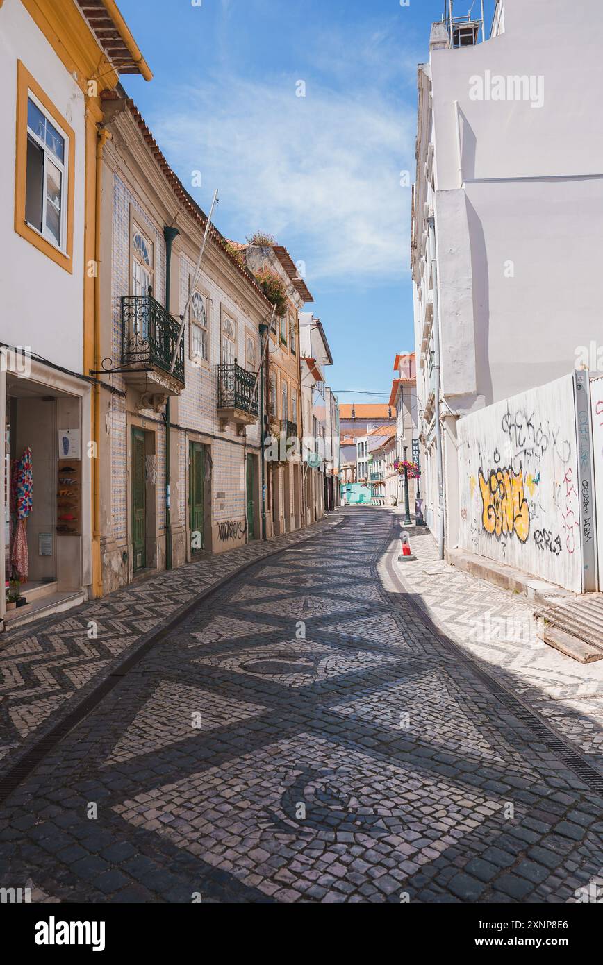 Charming Street in Aveiro, Portugal with Cobblestone Pavement and ...
