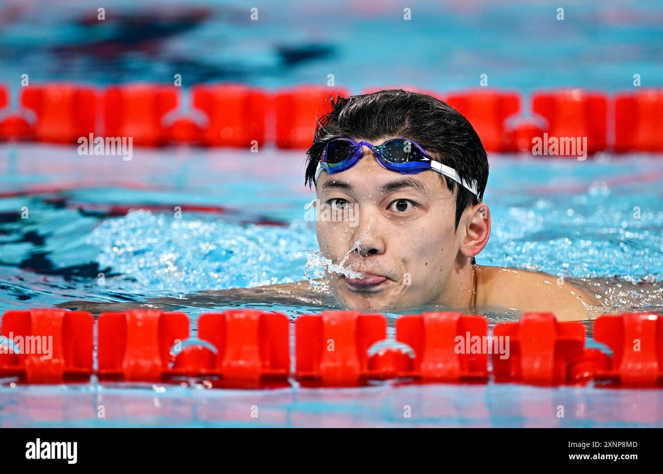 Paris, France. 1st Aug, 2024. Wang Shun of China reacts after the men's 200m individual medley ...