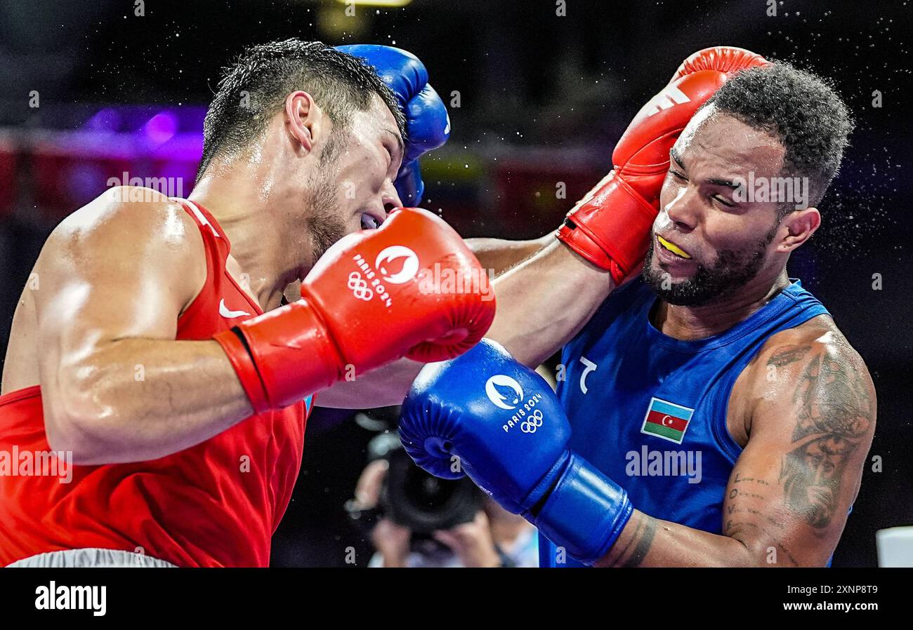 Paris, France. 1st Aug, 2024. Loren Berto Alfonso Dominguez (blue) of ...