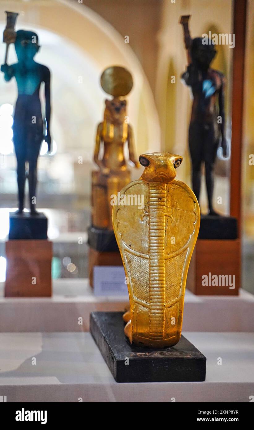Cairo,Egypt,December 31,2019-Gilded wood figure of Netjer-ankh,an ...