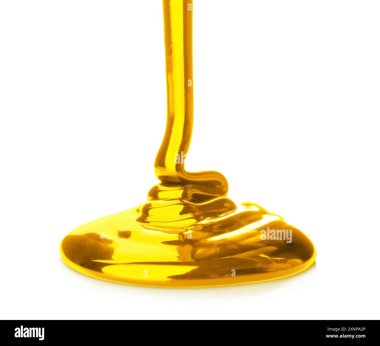 Pouring gold fluid on white background. Bright liquid Stock Photo - Alamy