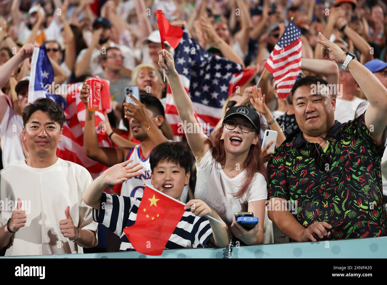 Paris, France. 1st Aug, 2024. Spectators cheer during the women's beach ...