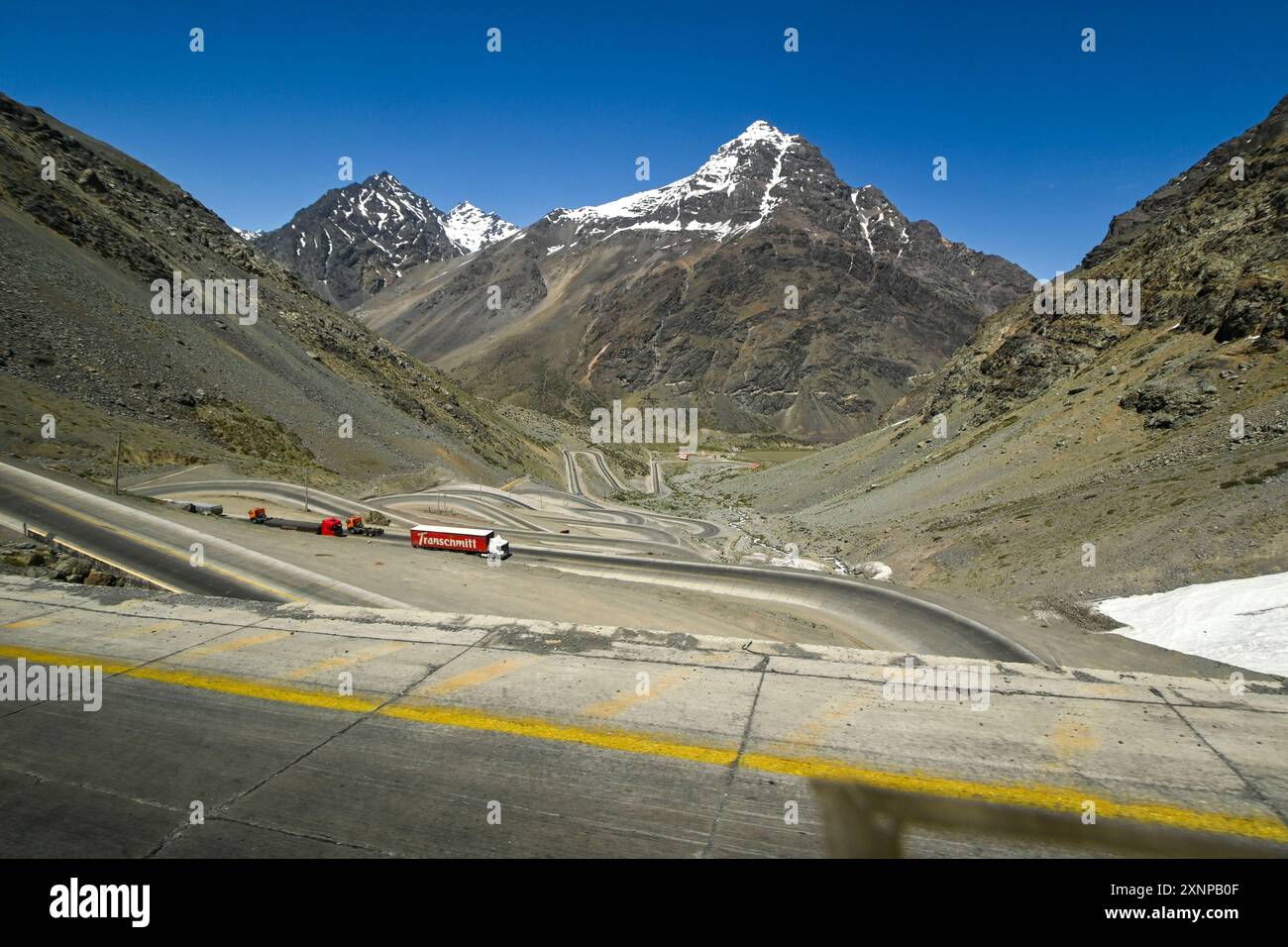 Los Caracoles desert highway, with many curves, in the Andes mountains ...