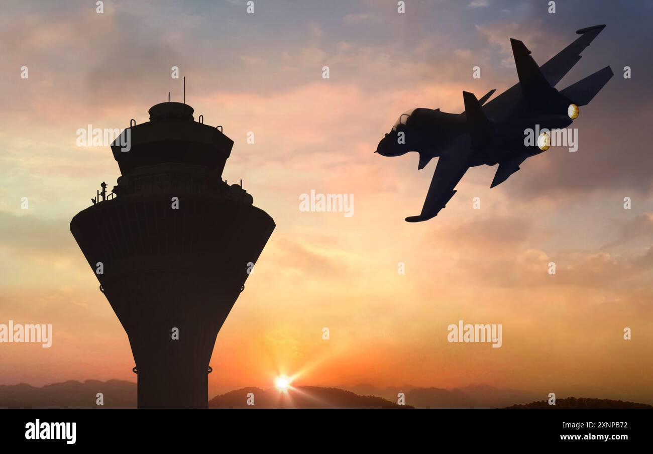 fighter jet flyby near airbase communication tower at sunrise Stock ...