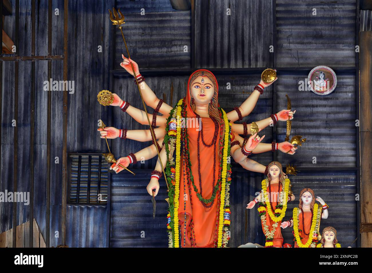 Idol of Goddess Devi Durga at a decorated puja pandal in Kolkata, West ...