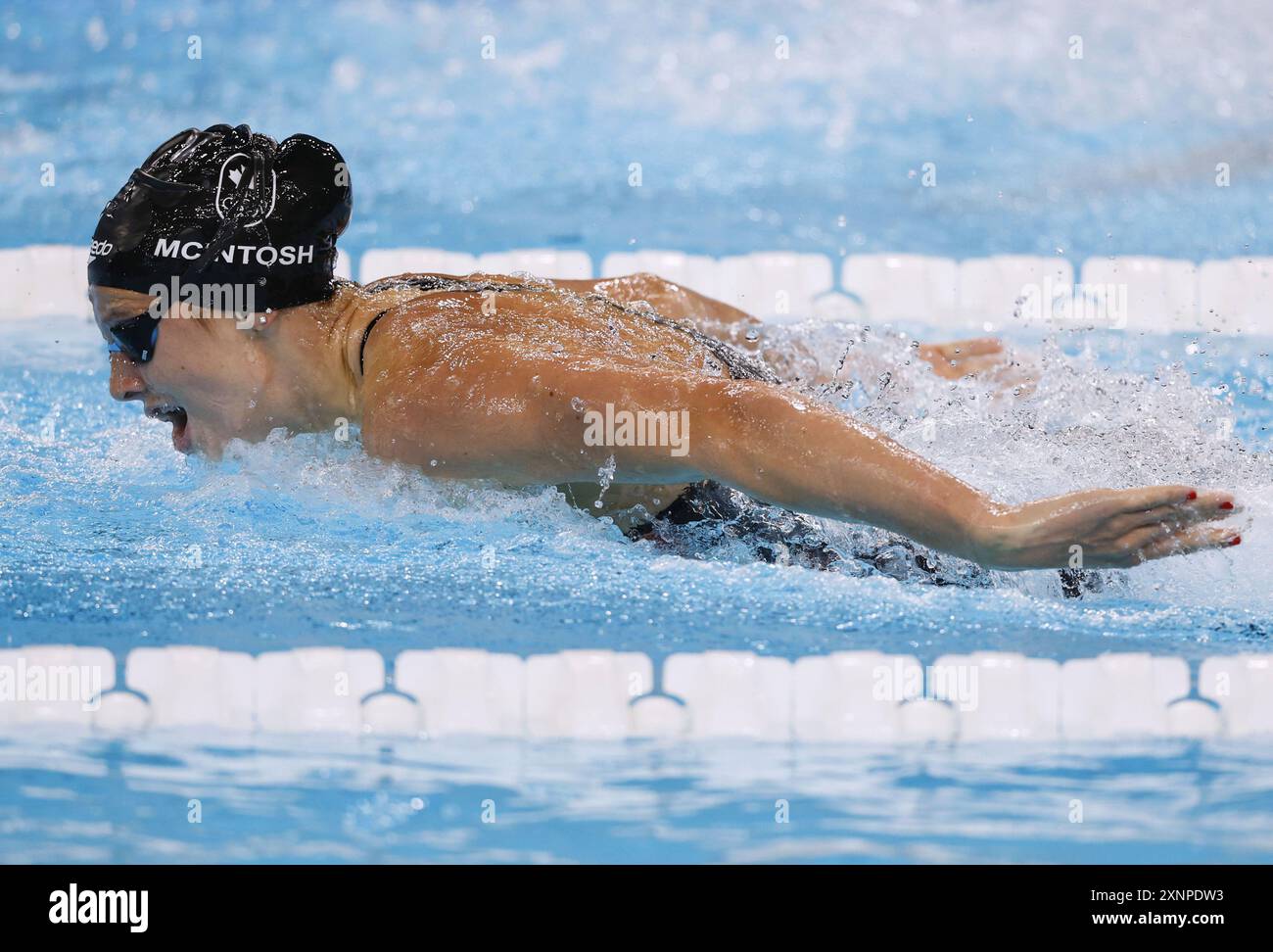 Canadian swimmer Summer McIntosh competes en route to winning gold in ...