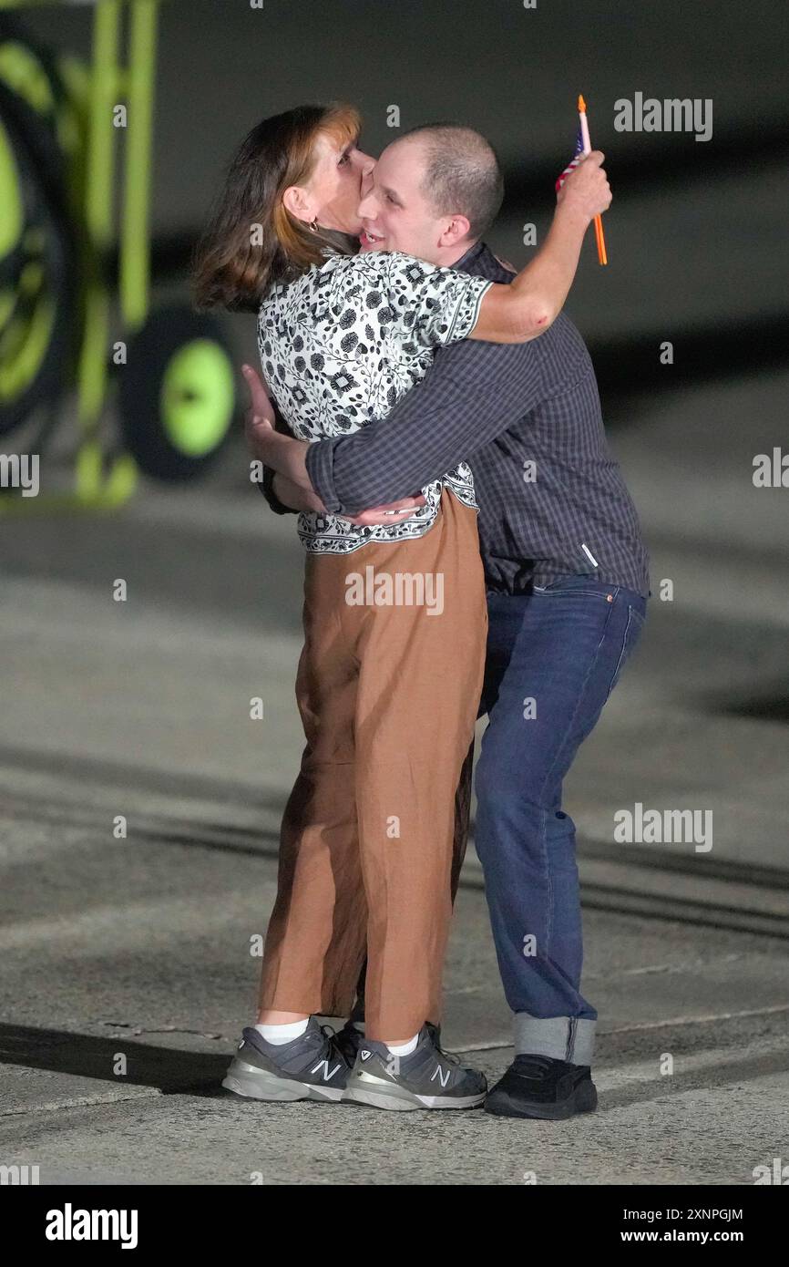 Reporter Evan Gershkovich hugs his mother, Ella Milman at Andrews Air ...