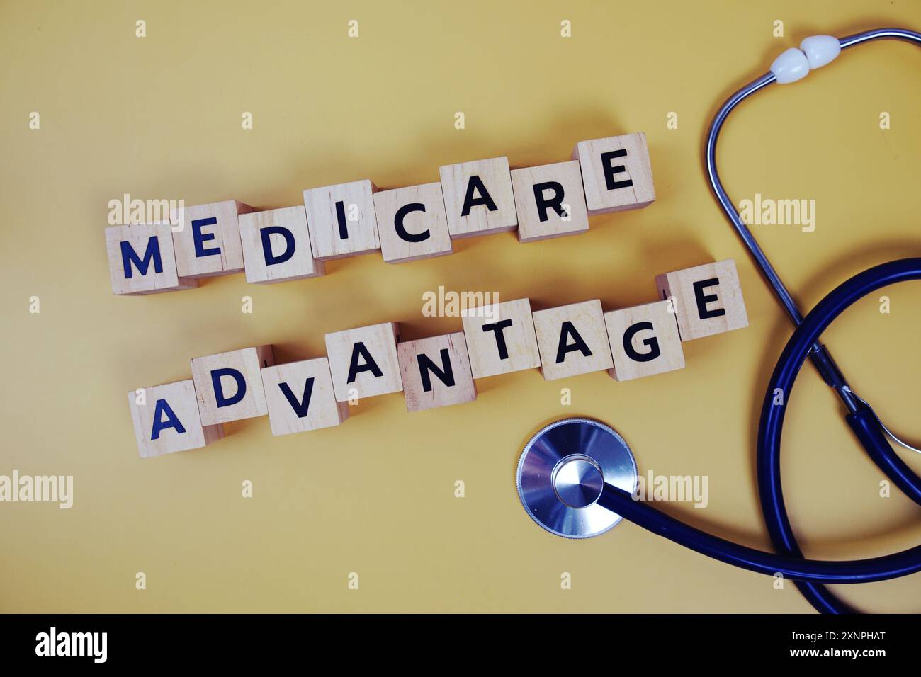 Medicare Advantage with wooden blocks alphabet letters and stethoscope ...