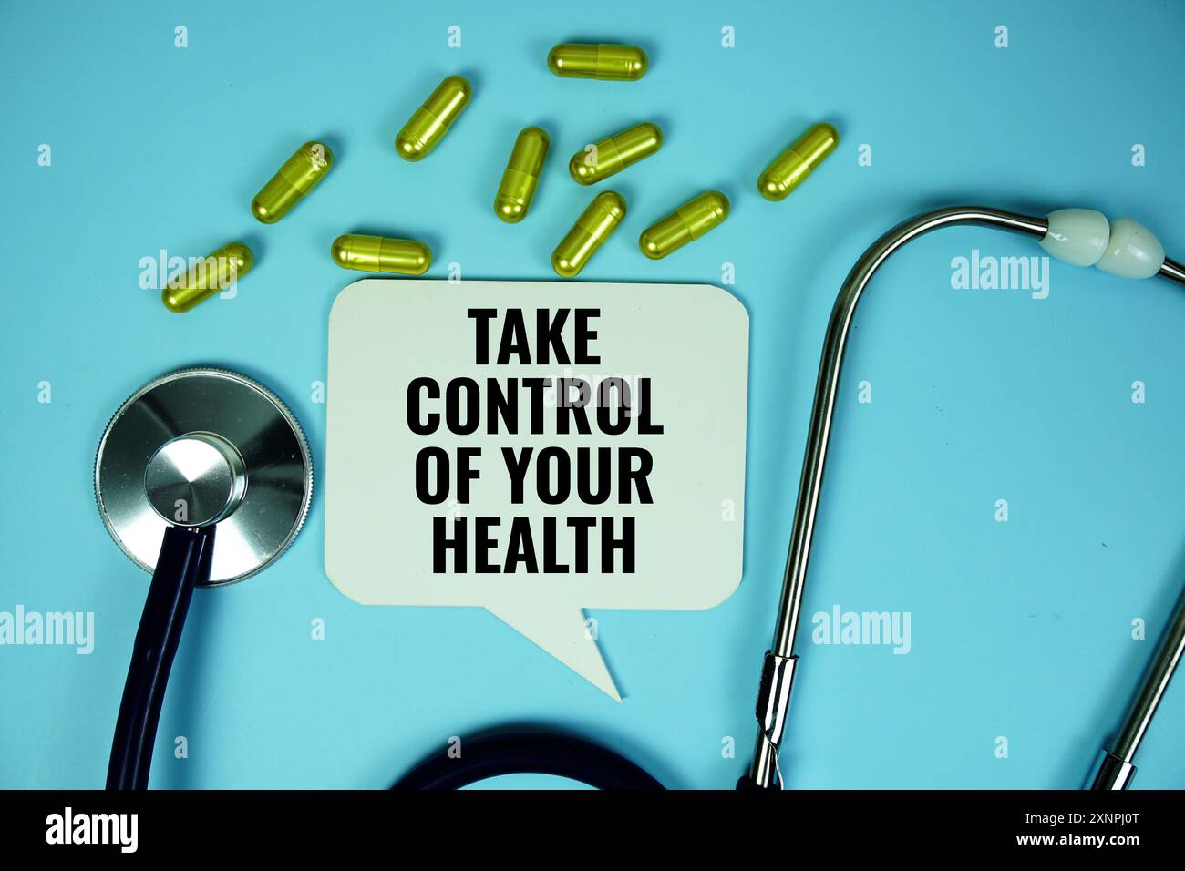 Take control of your health text with stethoscope and capsule medicine ...