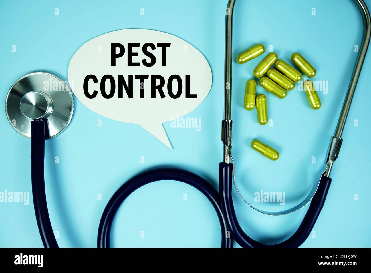Pest Control text with stethoscope and capsule medicine on blue ...
