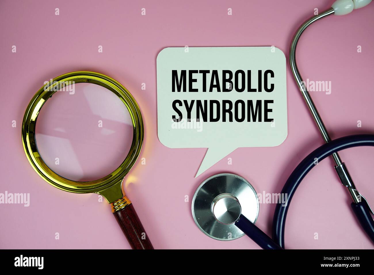 Metabolic Syndrome text with stethoscope and magnifying glass on pink ...