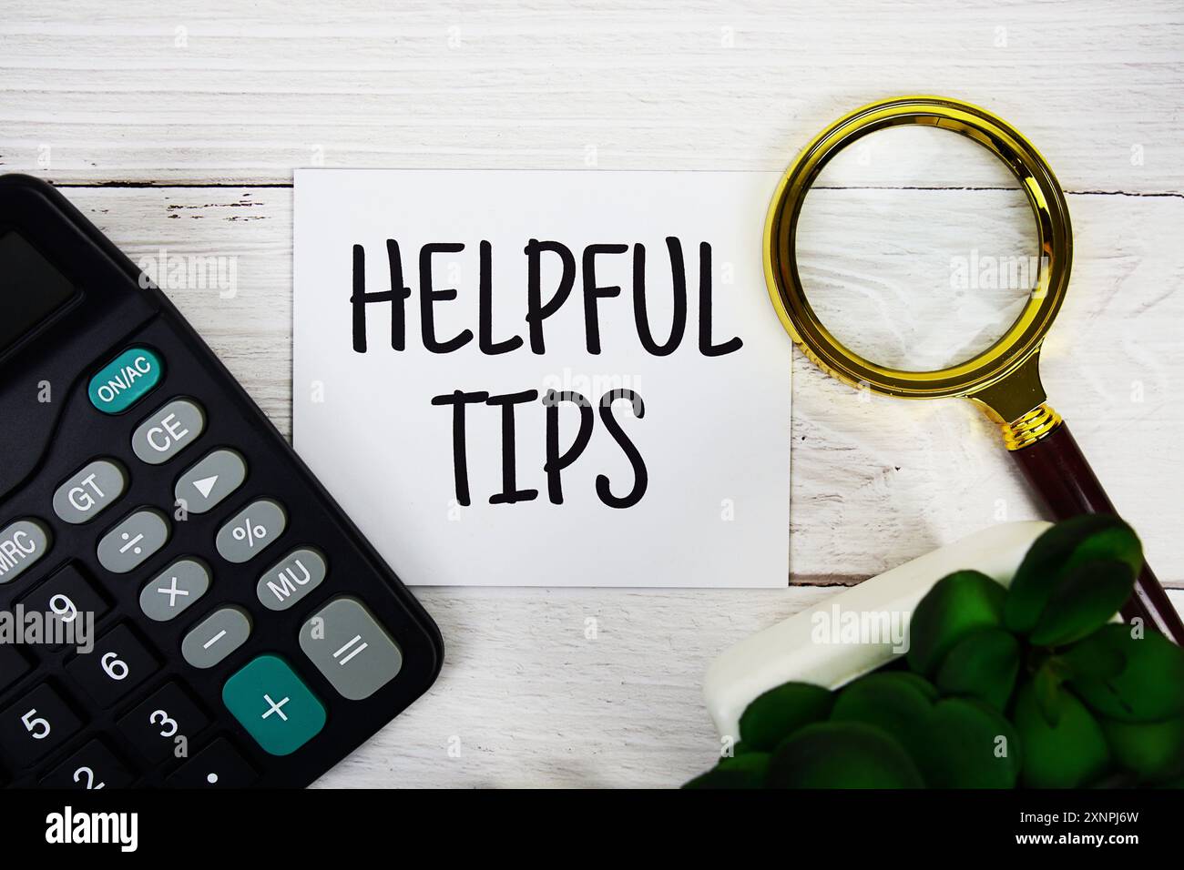 Helpful Tips text message with calculate and magnifying glass top view ...