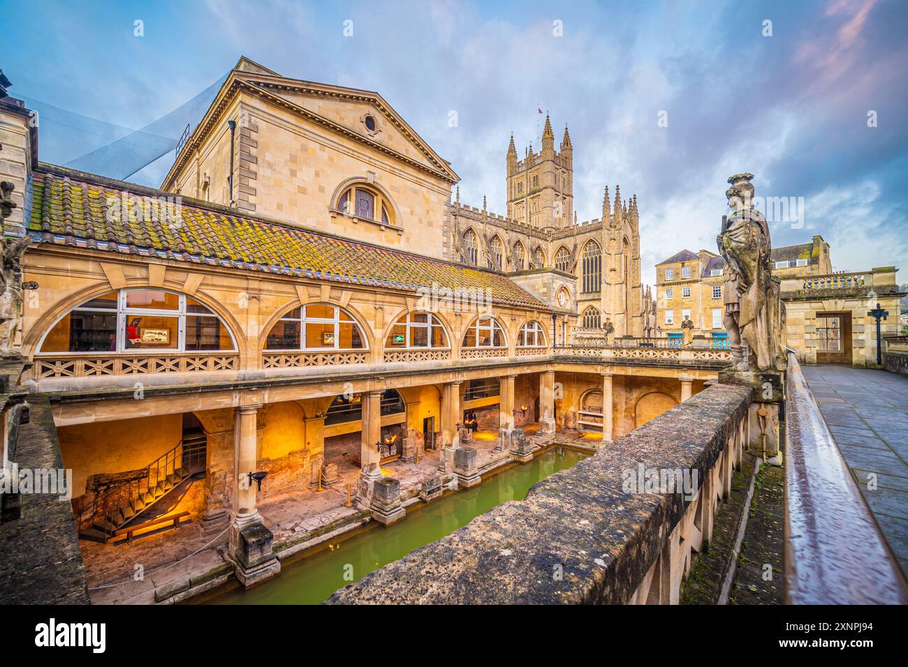 Historical roman bathes in Bath city, England at twilight Stock Photo ...