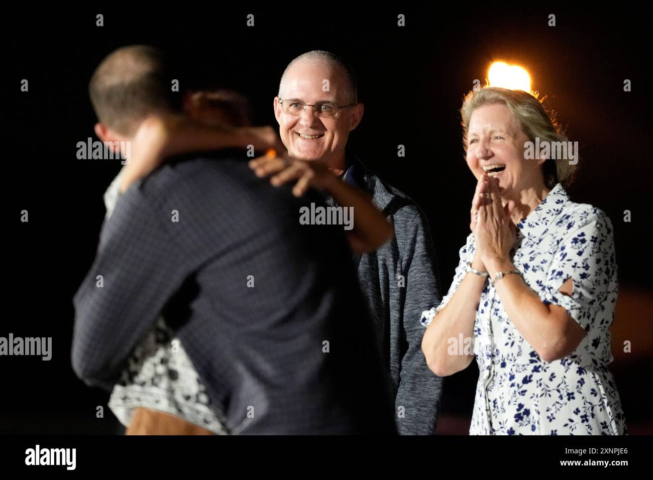 Ella Milman, mother of reporter Evan Gershkovich, from left, hugs her ...