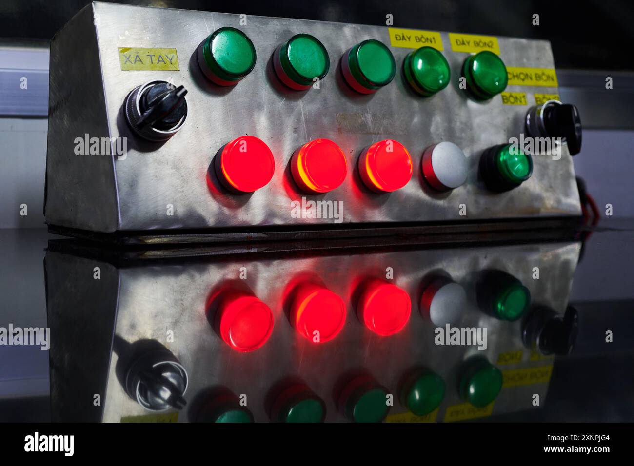 Close up of the buttons on a switching board inside a factory Stock ...