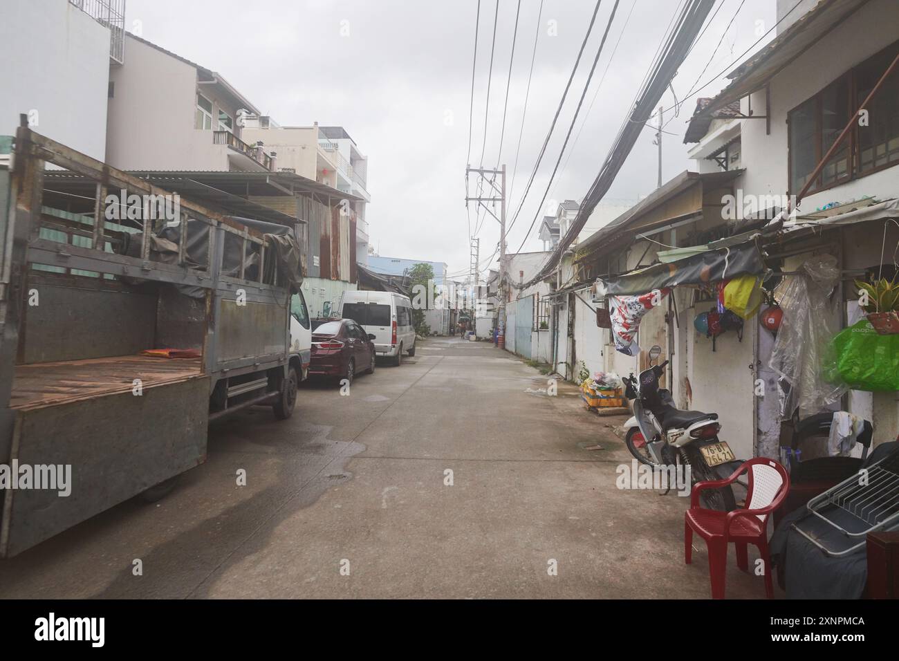 Back alley in the outskirts of HCM city in Vietnam Stock Photo - Alamy