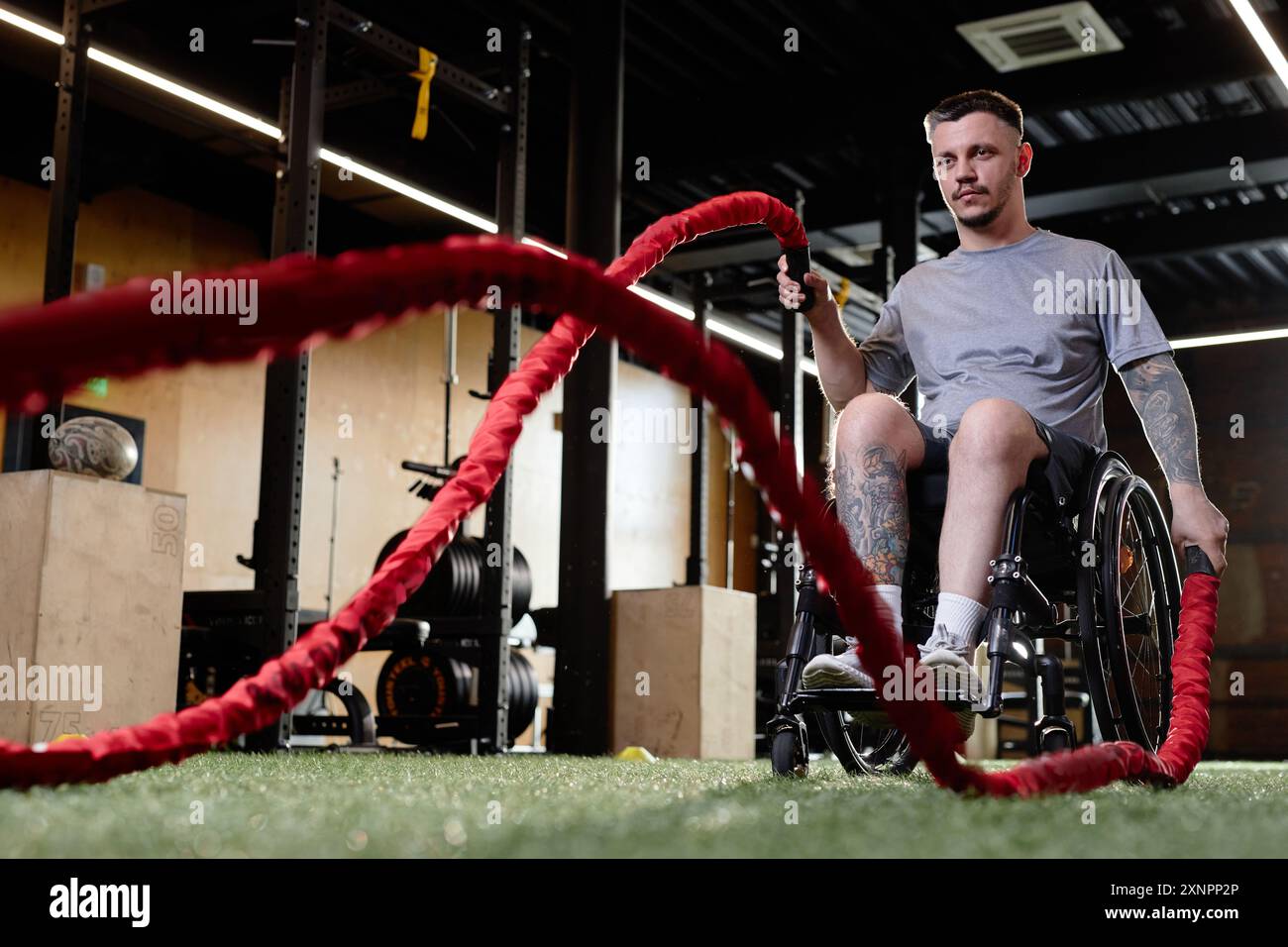 Motivational full length portrait of man with disability using ...