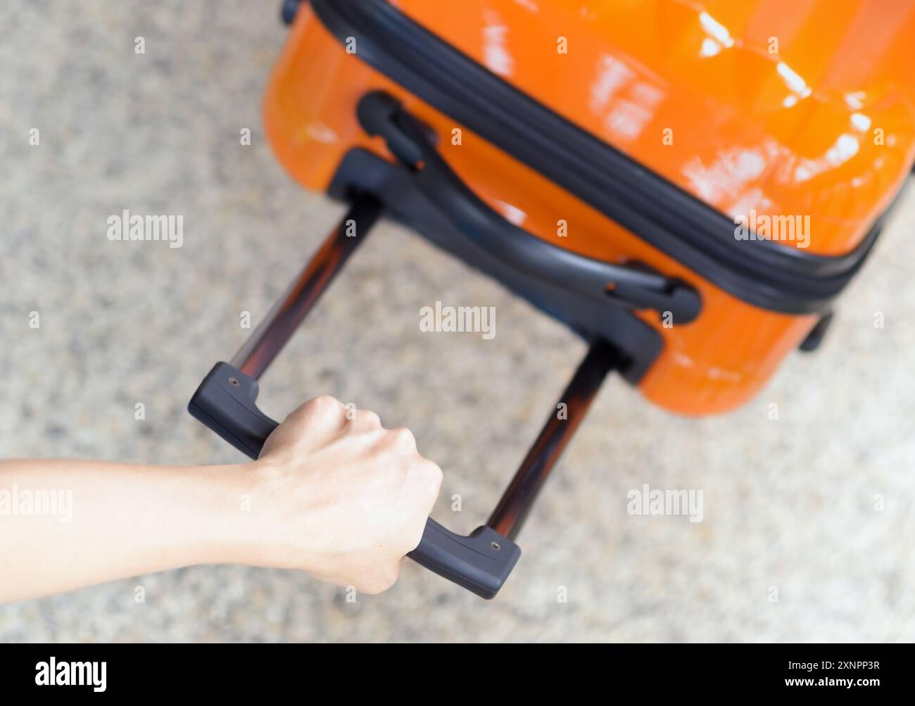 Suitcase in hand hi-res stock photography and images - Alamy