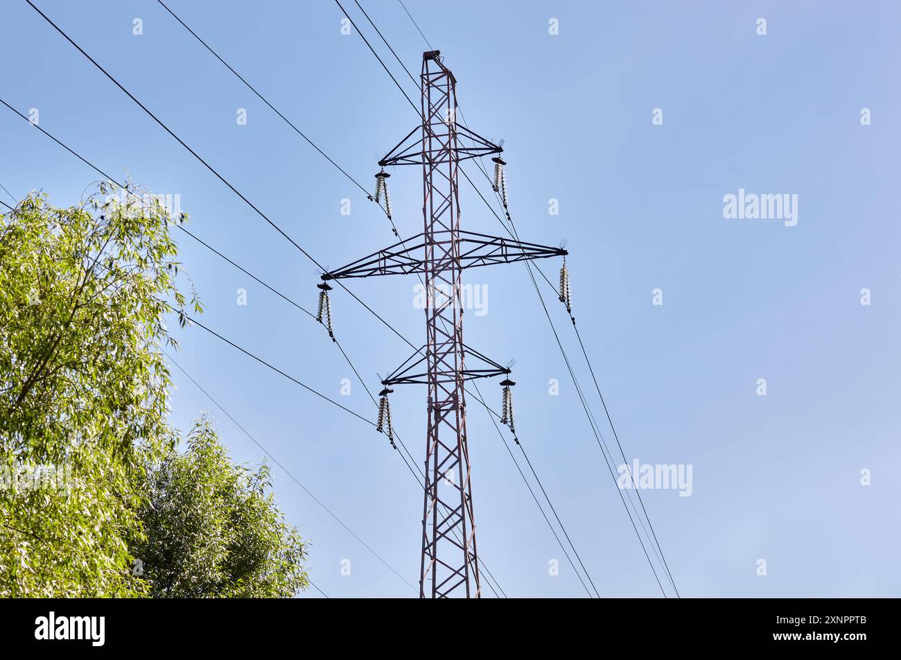 The large high-voltage transmission towers. Steel power pylon ...