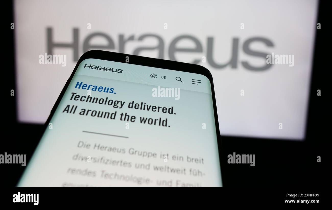 Mobile phone with website of German technology company Heraeus Holding ...