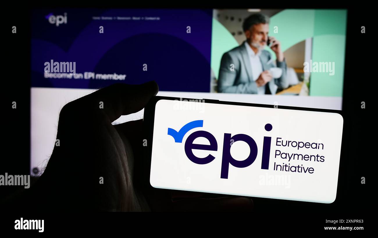 Person holding mobile phone with logo of European company European Payments Initiative (EPI) in ...