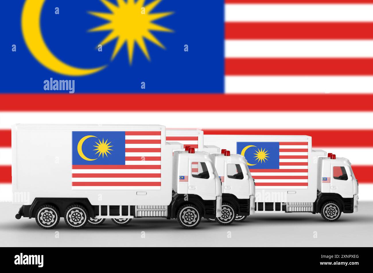 Malaysia flag depicted on side wall of white delivery van close up ...