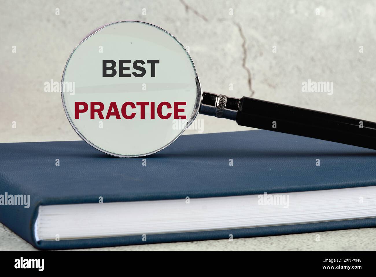 BEST PRACTICES text written through a magnifying glass located on a ...