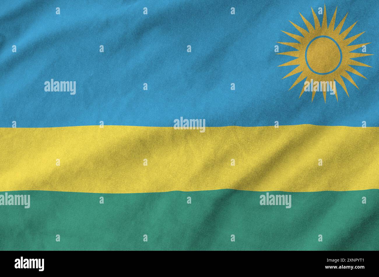 Rwanda flag depicted on folded wavy fabric of old cloth close up Stock ...