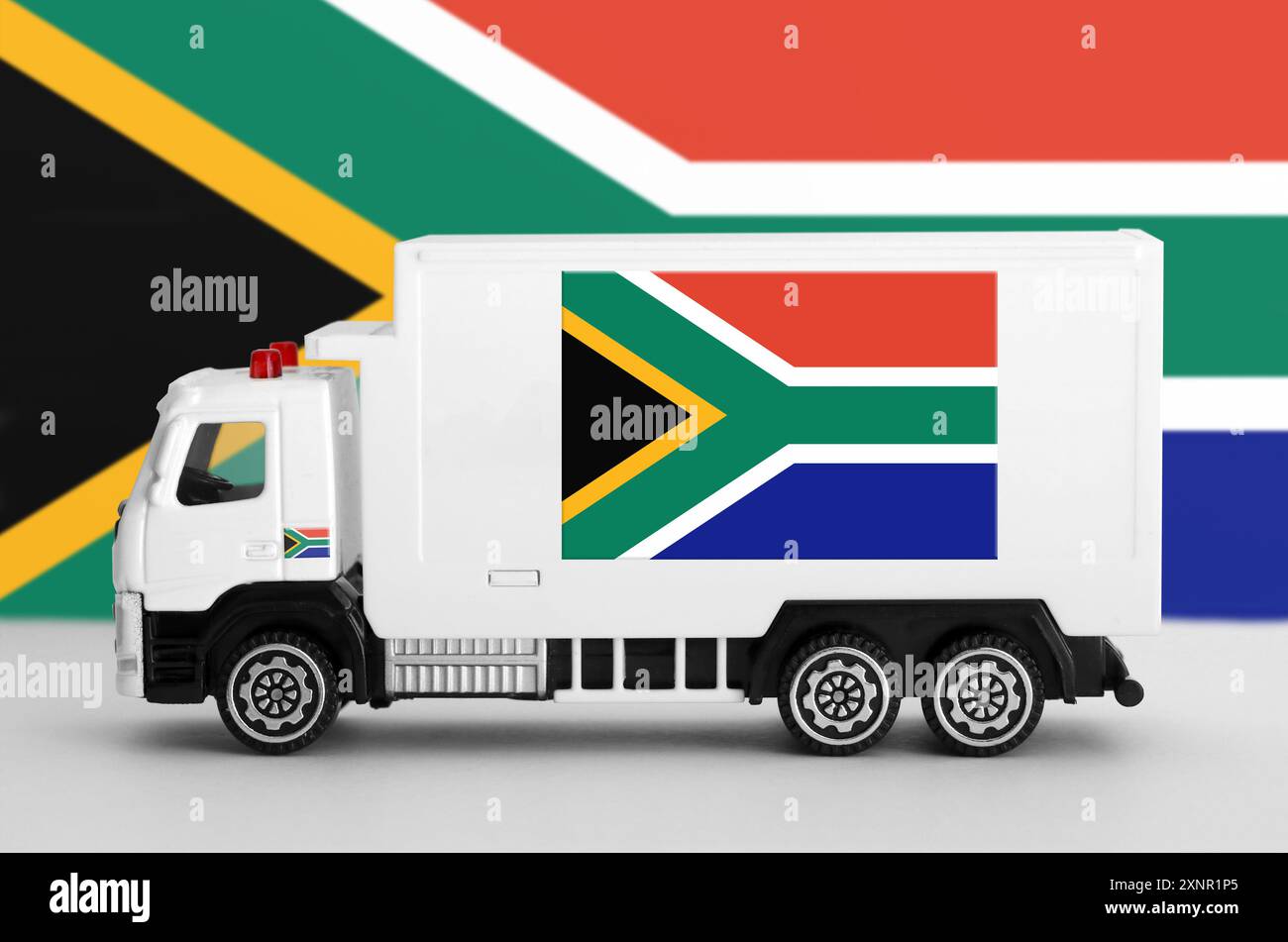 South Africa flag depicted on side wall of white delivery van close up ...
