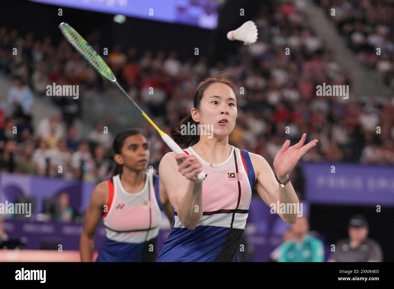 Malaysia's Pearly Tan, right, and Muralitharan Thinaah play against China's Chen Qingchen and ...