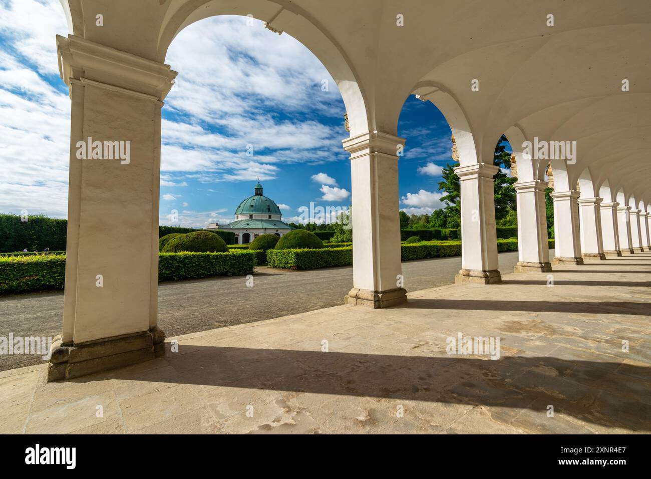 View through the arcades of the baroque colonnade with statues of ...