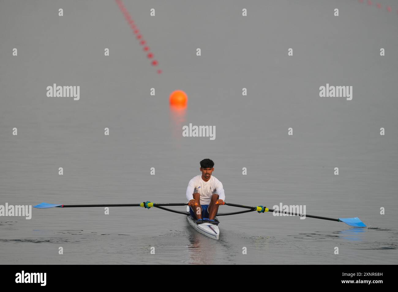 Balraj Panwar, of India, trains ahead of the men's single sculls rowing ...