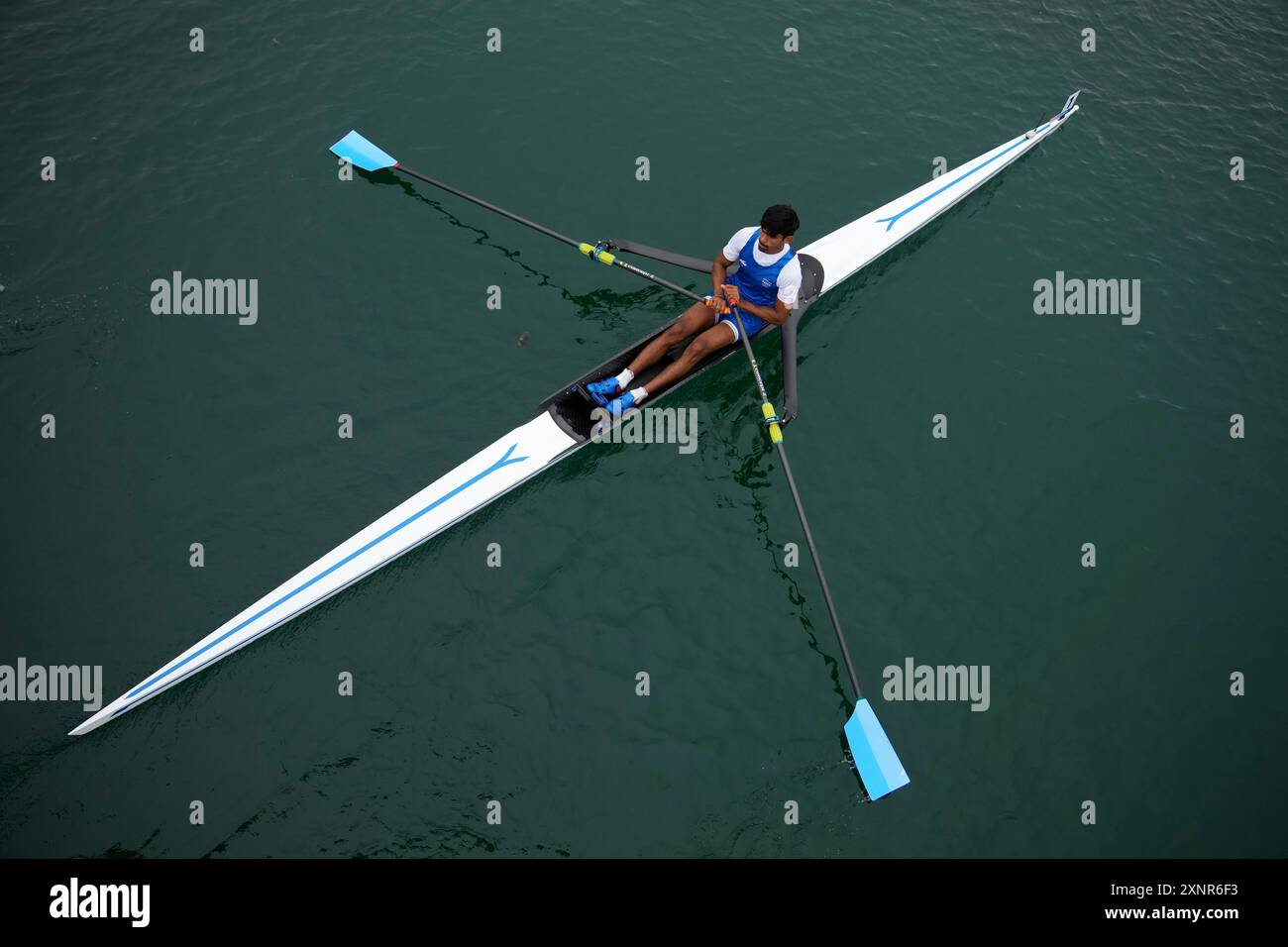 Balraj Panwar, of India, trains ahead of competition in the men's ...