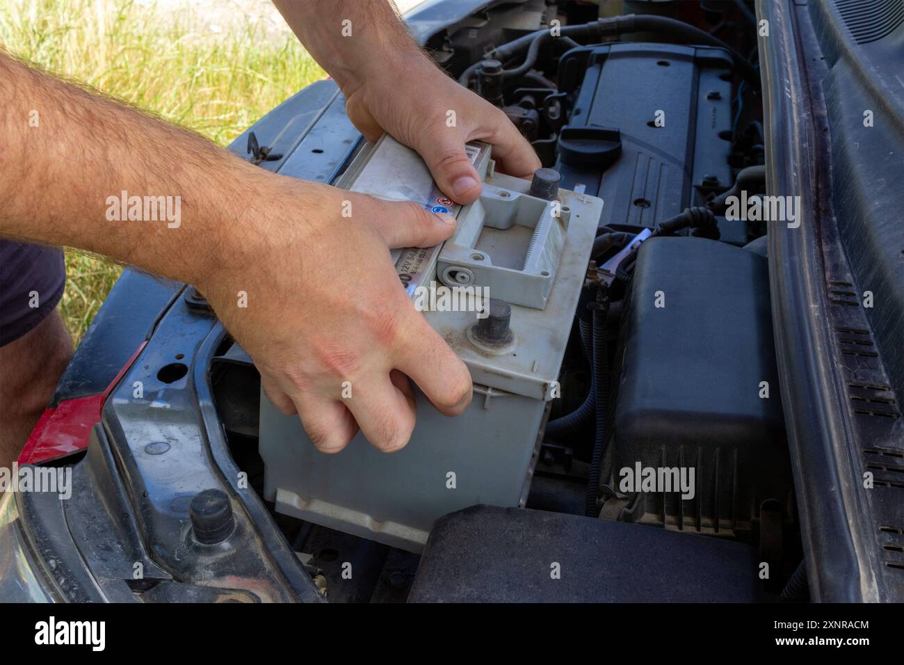 Removing old battery from car hi-res stock photography and images - Alamy