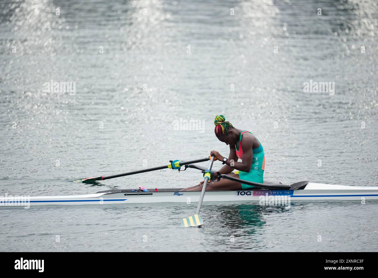 Akoko Komlanvi, of Togo, reacts after the women's single sculls rowing ...