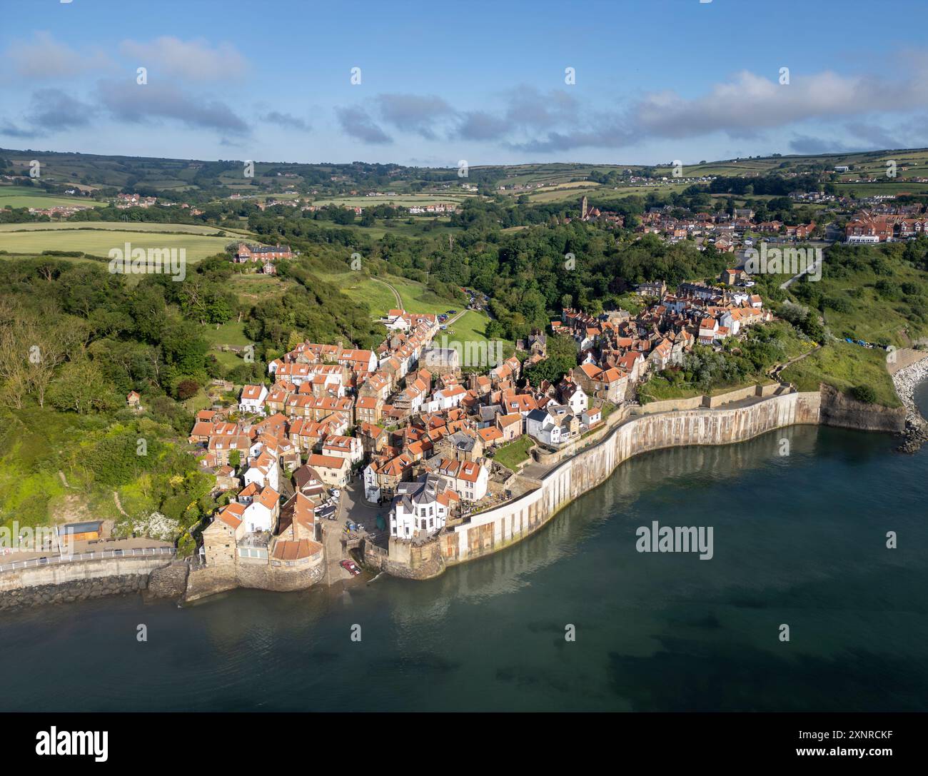 Aerial view of village of Robin Hood's Bay at high tide, North ...