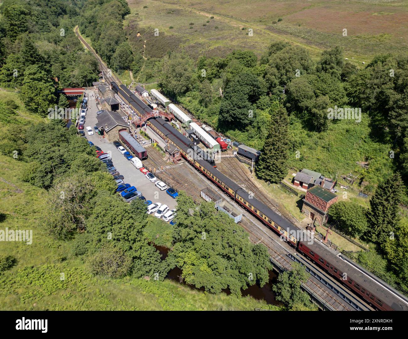 Steam train arrives at Goathland railway station, North Yorkshire ...