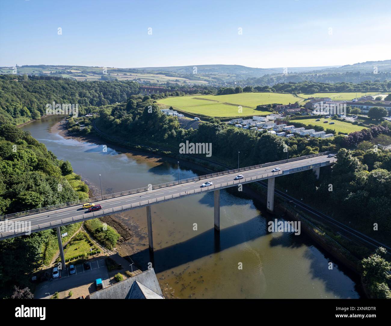 Aerial view as cars cross New bridge, A171 over Whitby River Esk, North ...